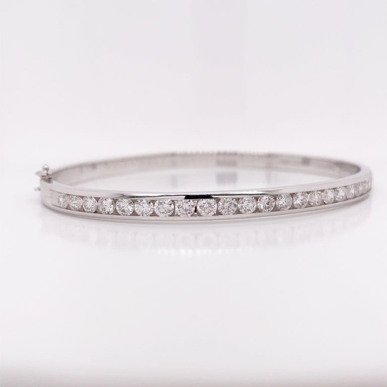 Channel Set Diamond White Gold Bangle Bracelet For Sale at 1stDibs