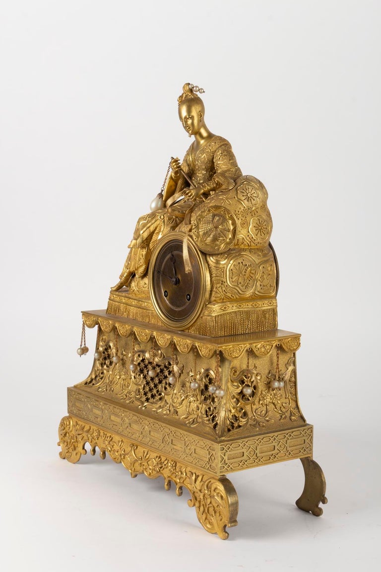 Charles X Period Clock in Golden Bronze, 19th Century For Sale at 1stDibs