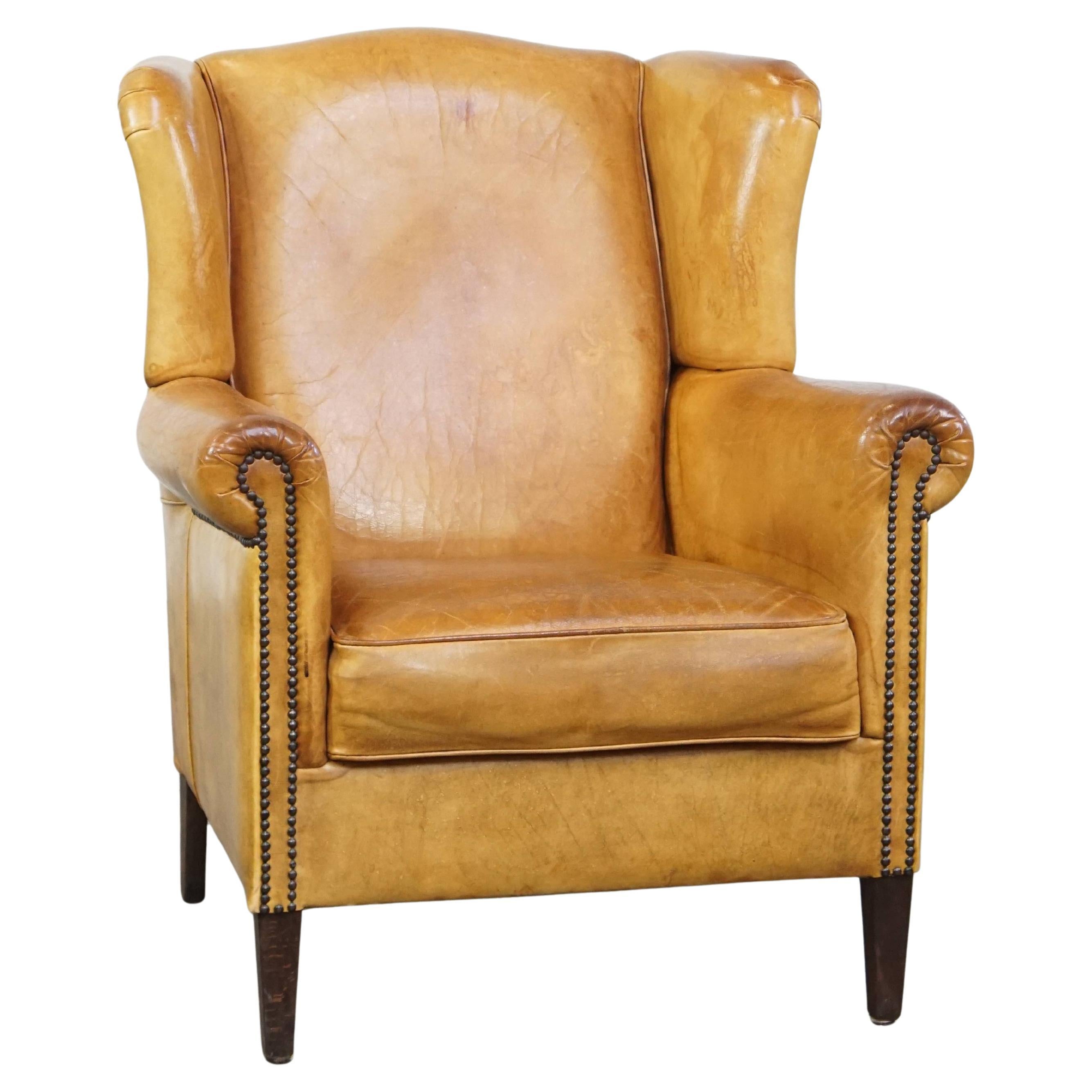 Vintage cowhide leather English Chesterfield wingback chair, light ...
