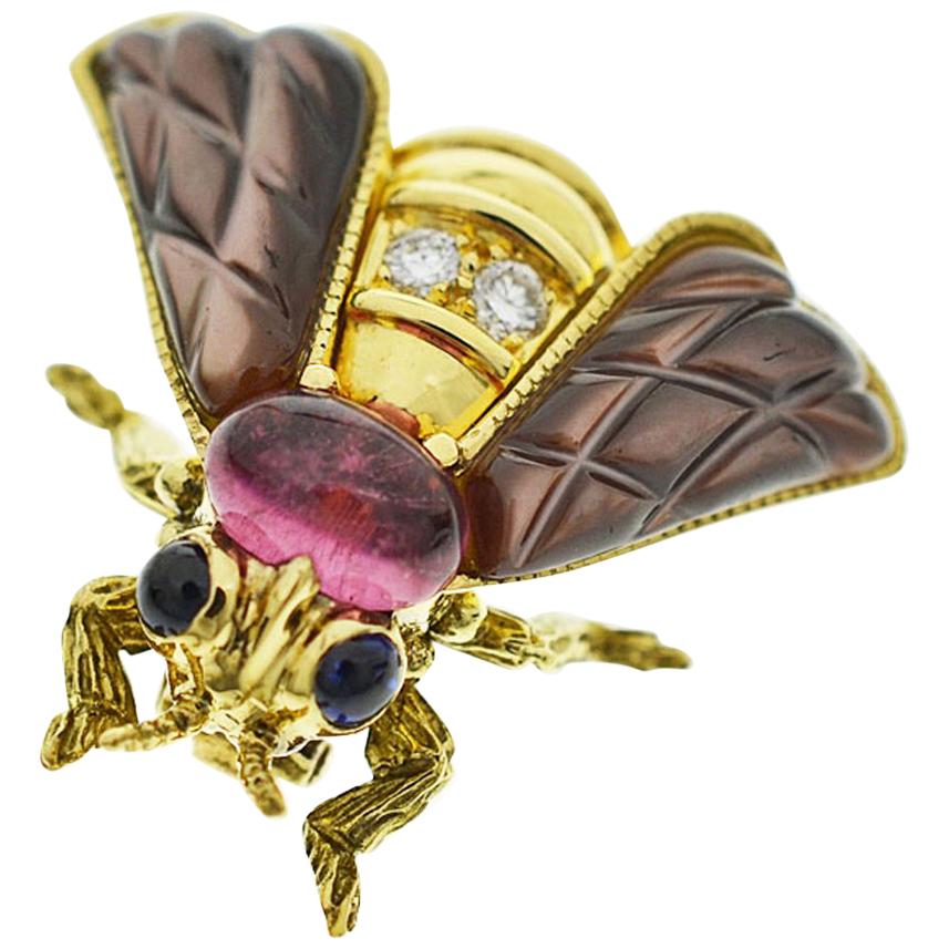 Chaumet of Paris gold,lapis,malachite golfing brooch For Sale at 1stDibs