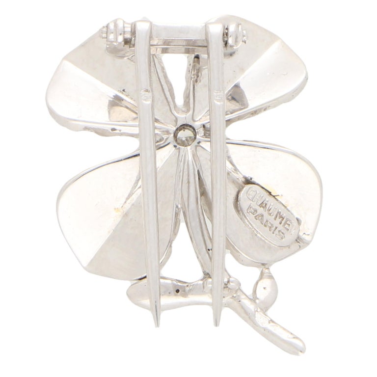 Chaumet Paris Diamond Flower Brooch Set in 18 Karat White Gold at 1stDibs