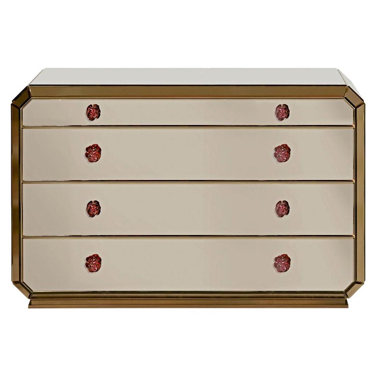 Chest of Drawers Covered with Amber Mirror Bronzed Skirting Glass ...