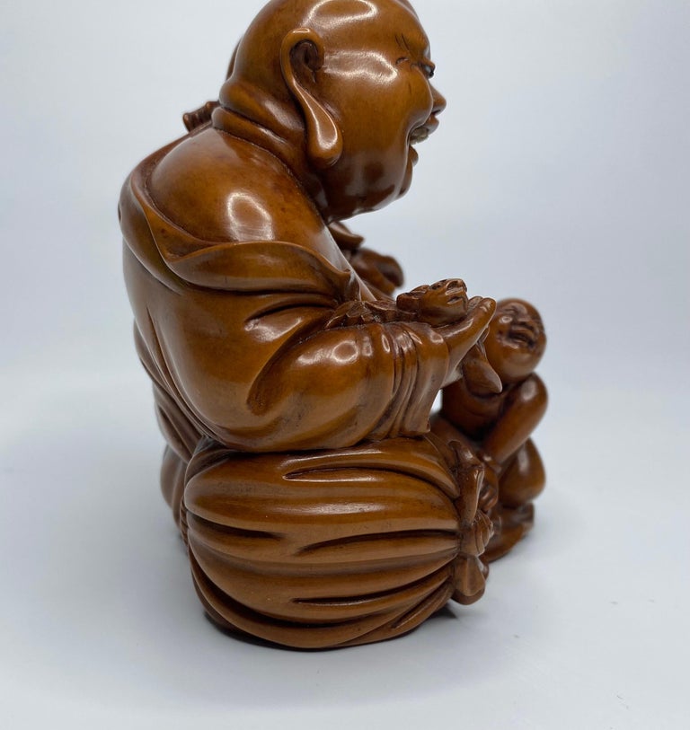 Chinese boxwood Buddha, c. 1900. Qing Dynasty. For Sale at 1stDibs