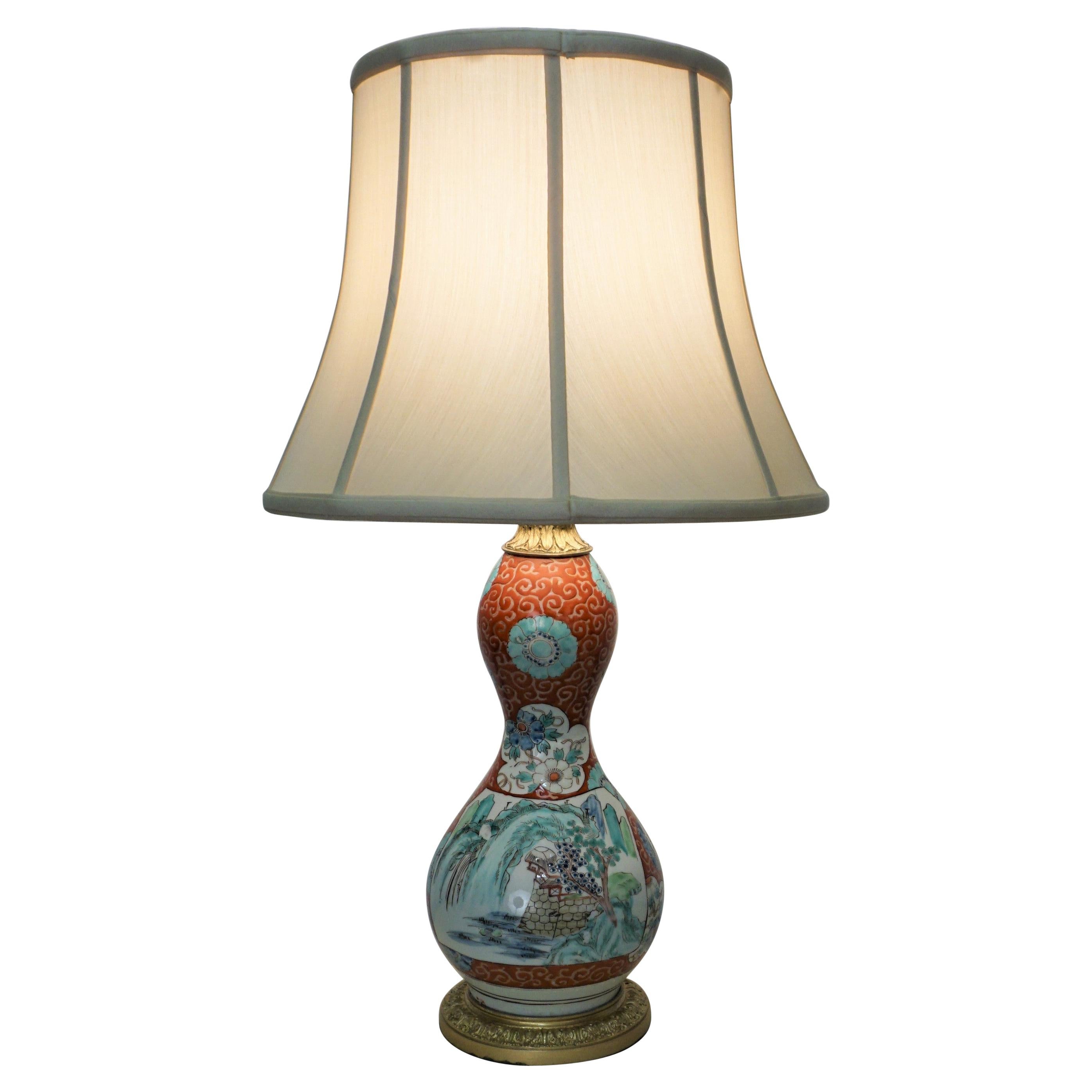 A Chinese Blue and White Porcelain Lamp Base with French Bronze Mounts ...
