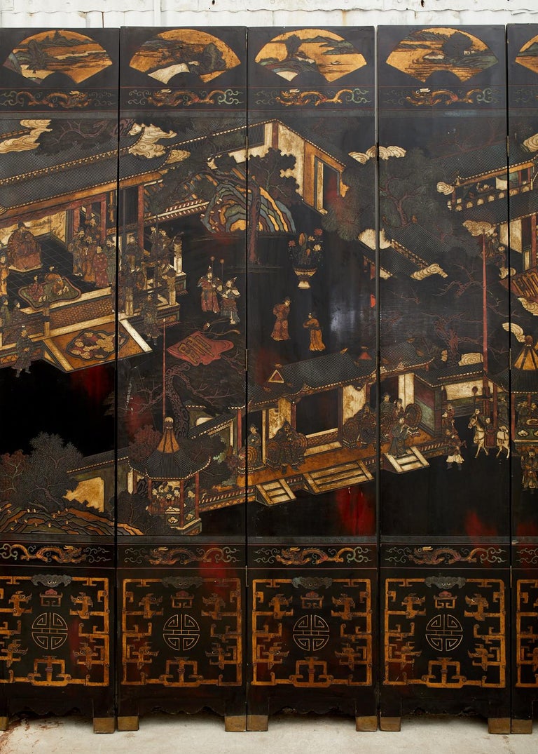 Chinese Qing Twelve Panel Lacquered Coromandel Screen For Sale at 1stDibs
