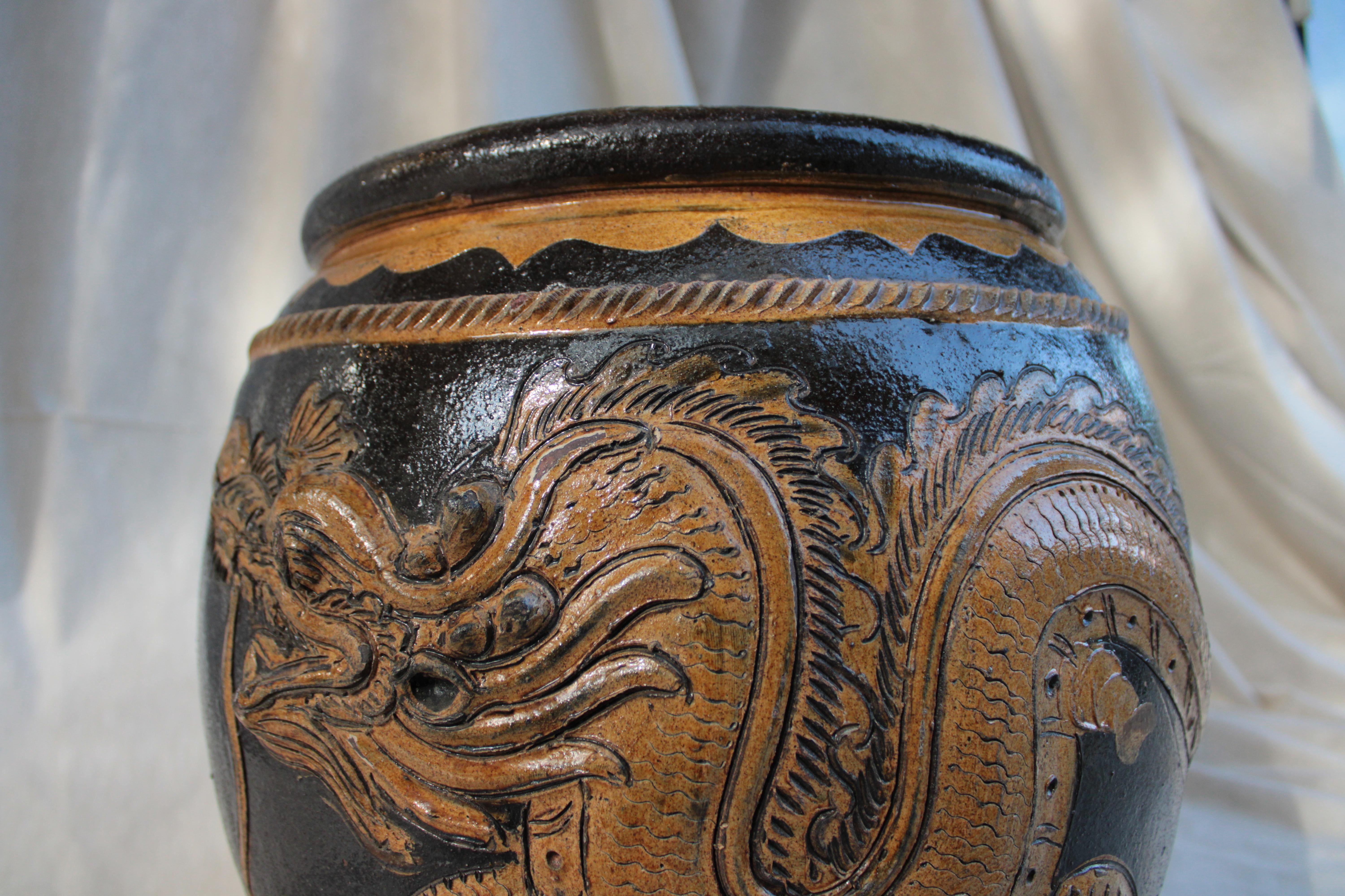 Chinese stoneware vase Qing Dynasty, decorated with raised dragons and ...
