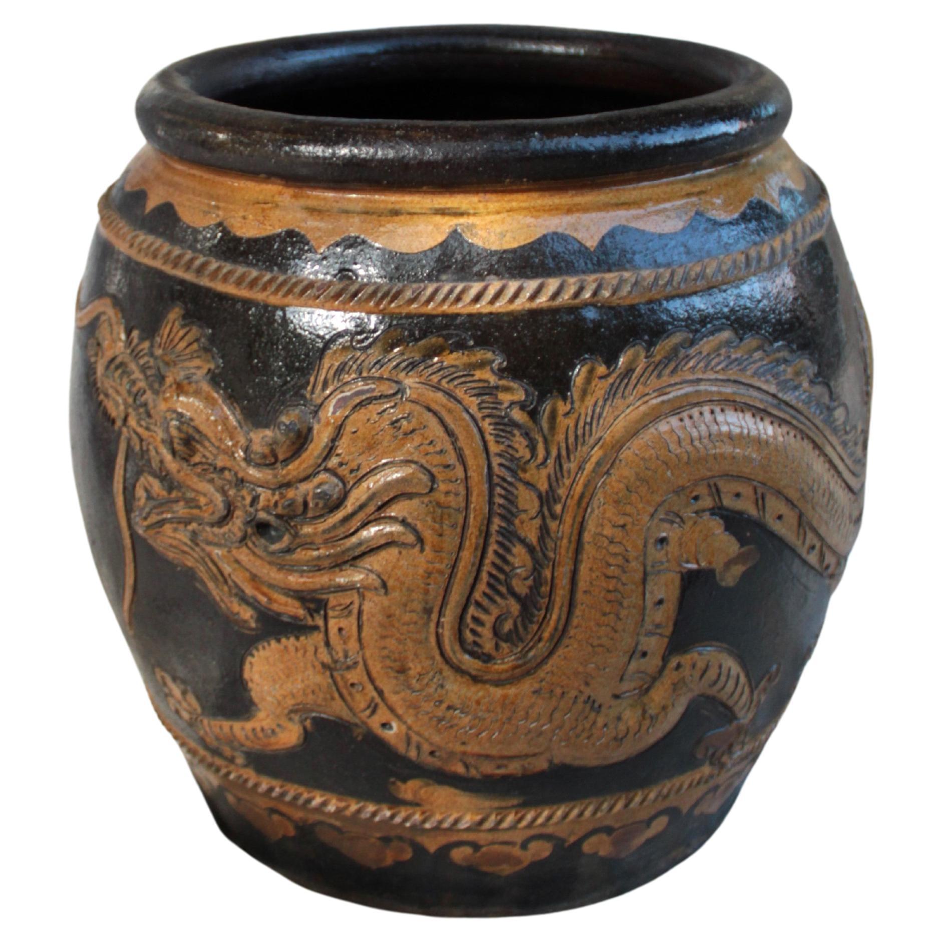 Chinese stoneware vase Qing Dynasty, decorated with raised dragons and ...
