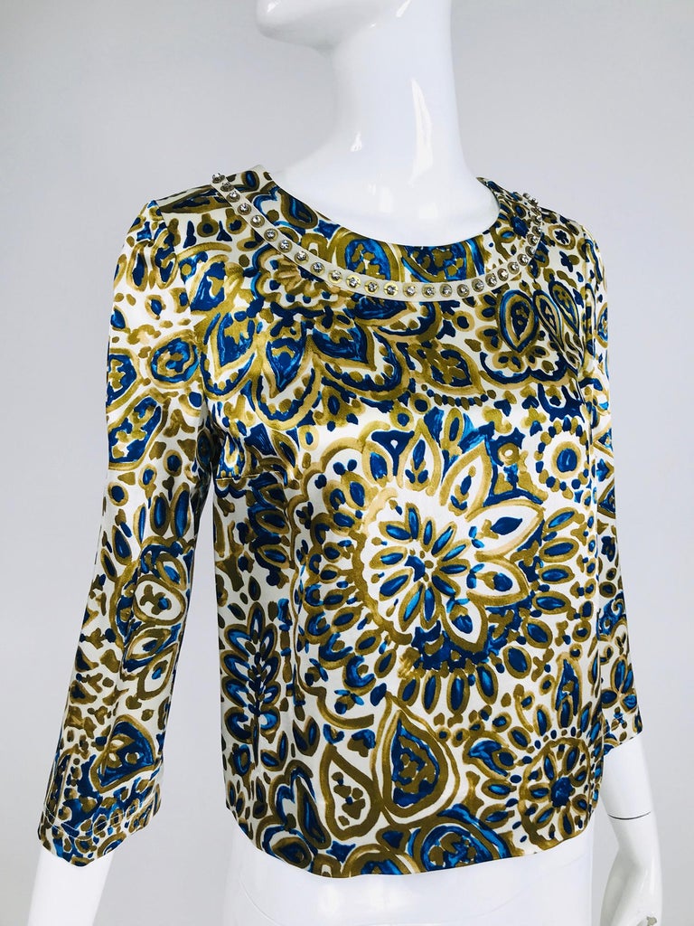 Chloe' Gold and Blue Rhinestone Jewel Neckline Blouse For Sale at 1stDibs