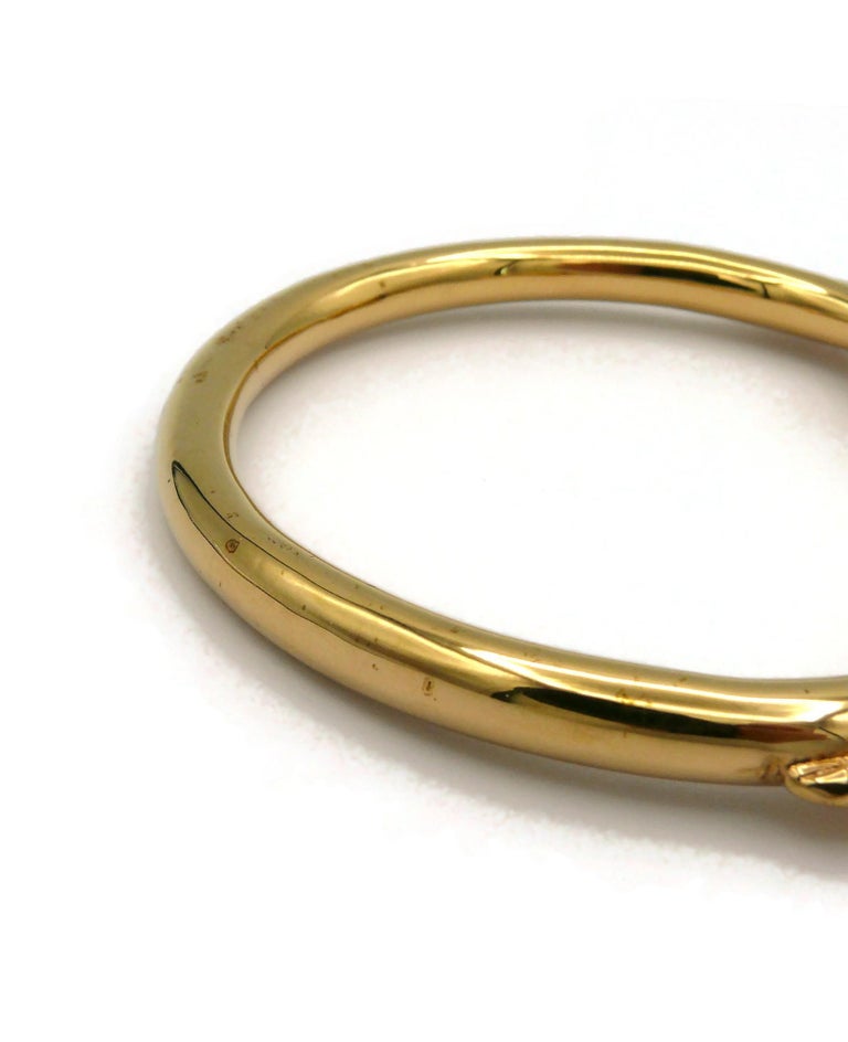 CHLOE Gold Tone Double Horse Head Bangle Bracelet For Sale at 1stDibs
