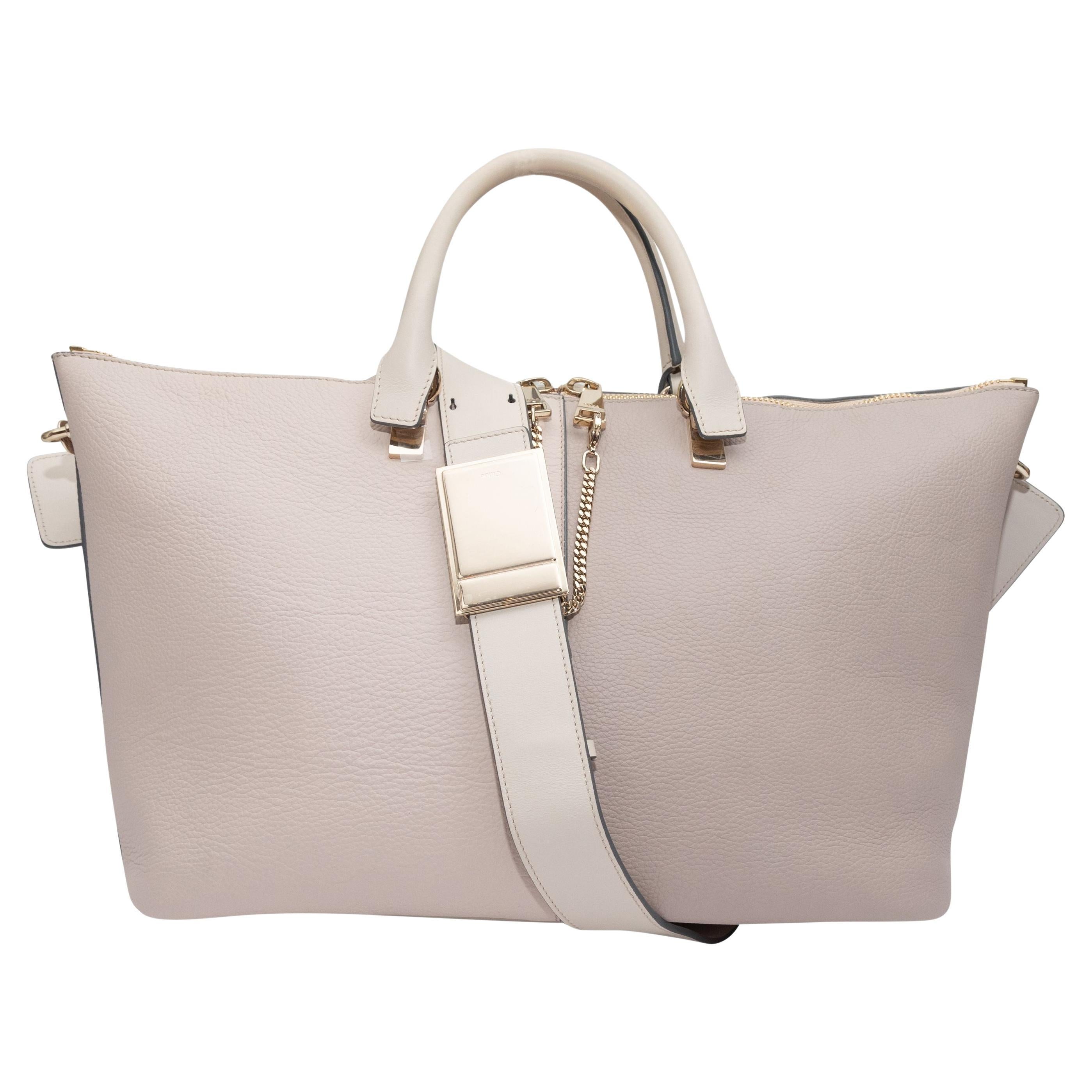 TIFFANY and CO. Metallic Silver Leather and Blue Suede Reversible ...