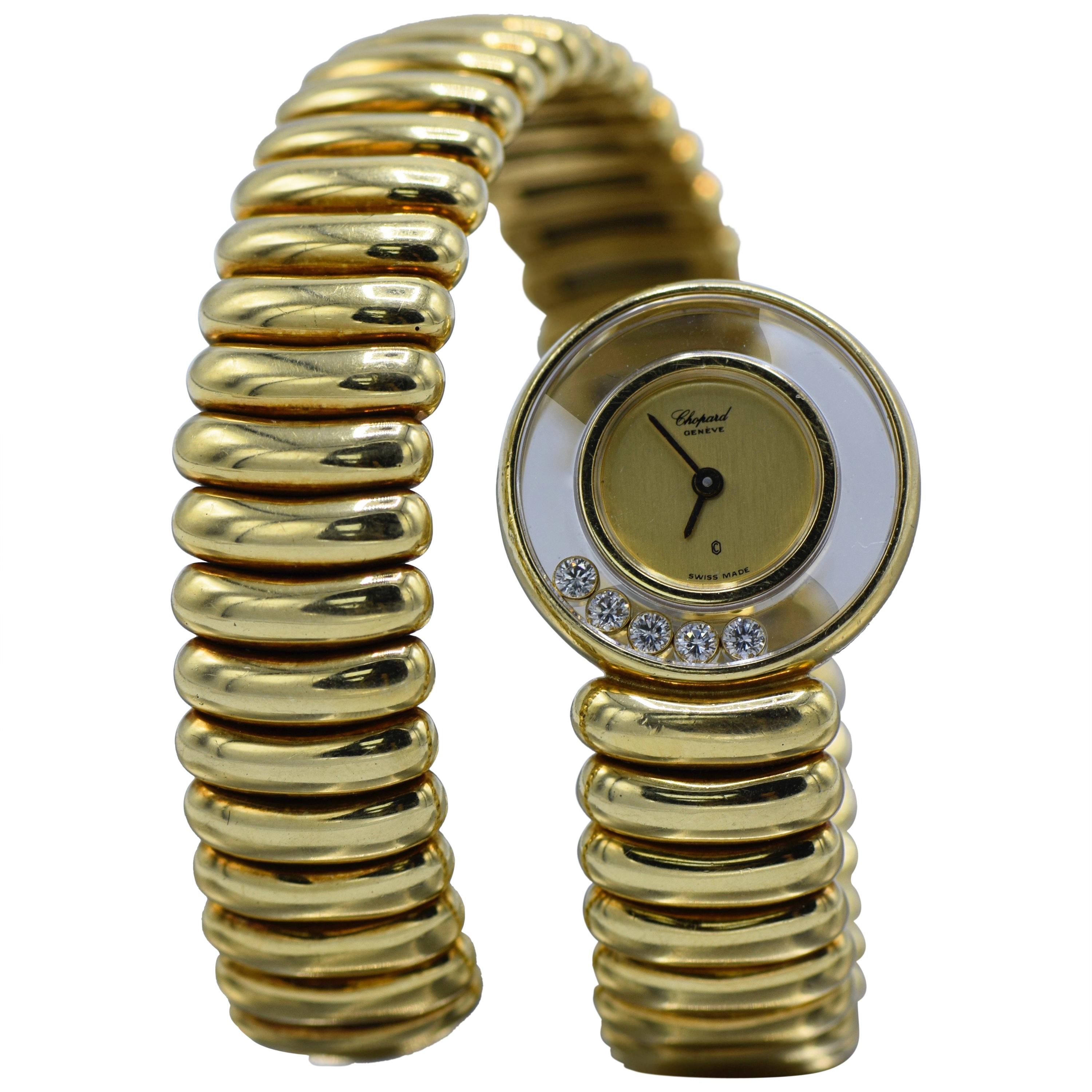 CHOPARD Yellow Gold, Diamond, Ruby Happy Diamonds Bangle Watch at 1stDibs