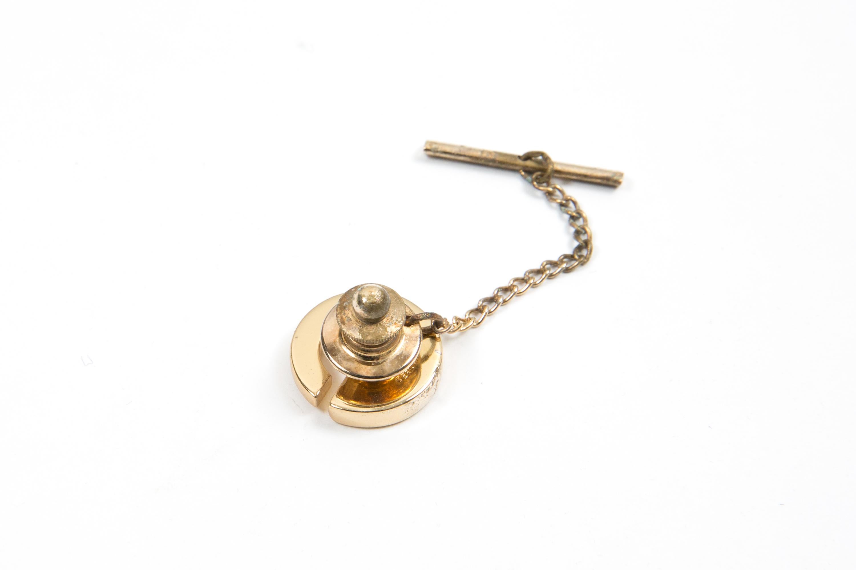 Christian Dior Gold Tone Tie Round Pin For Sale at 1stDibs