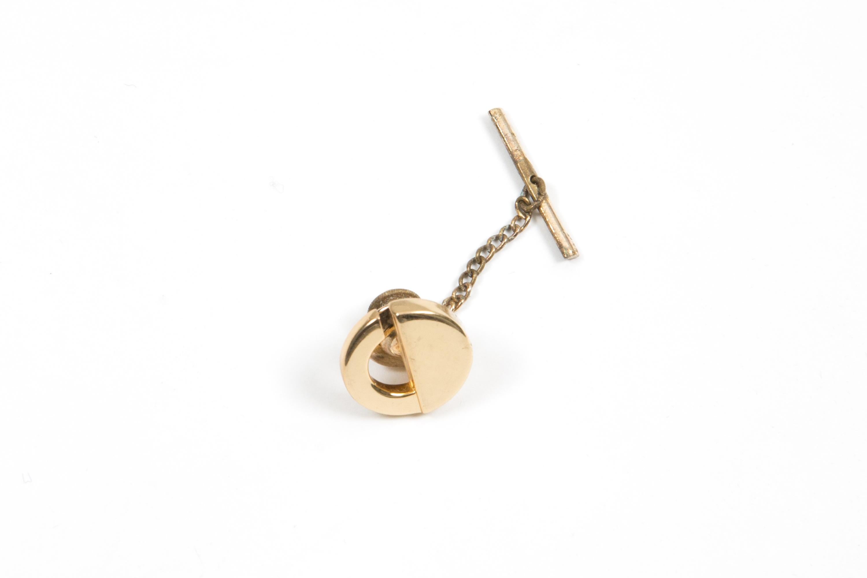 Christian Dior Gold Tone Tie Round Pin For Sale at 1stDibs
