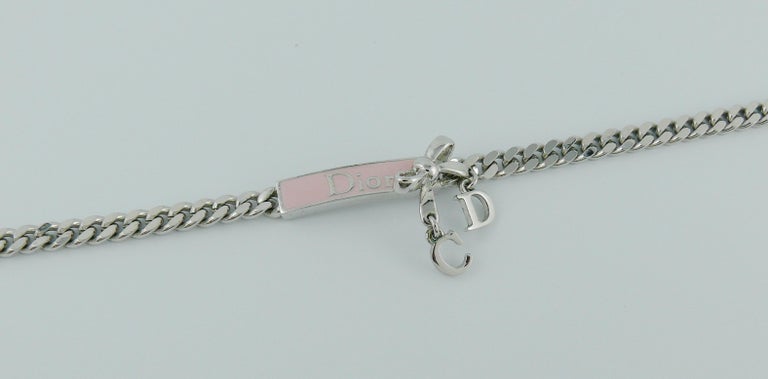 Christian Dior Silver Toned Pink Enamel Dior Tag Bow Necklace at ...