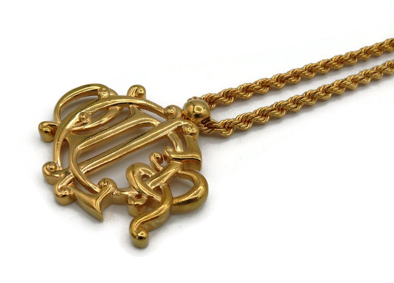 CHRISTIAN DIOR Vintage Gold Tone Logo Pendant Necklace For Sale at 1stDibs