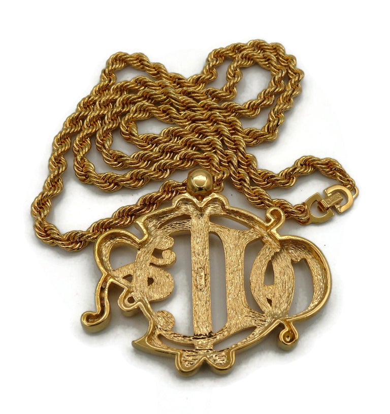 CHRISTIAN DIOR Vintage Gold Tone Logo Pendant Necklace For Sale at 1stDibs