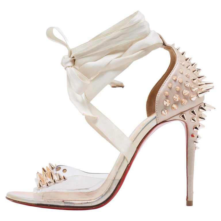 Christian Louboutin Beige Studded Leather and PVC Ankle Tie Sandals ...