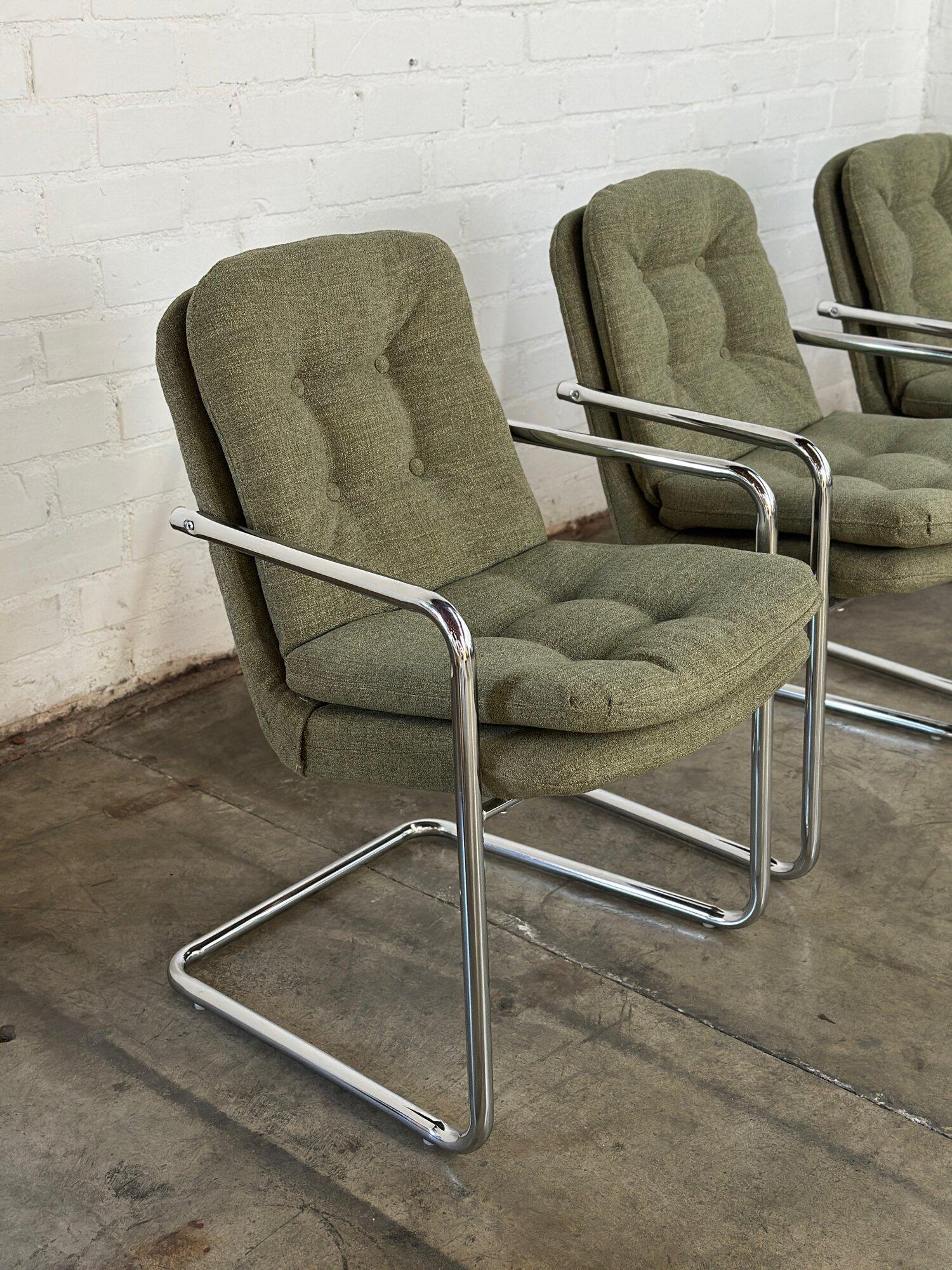 Chrome cantilevered dining chairs -set of four at 1stDibs