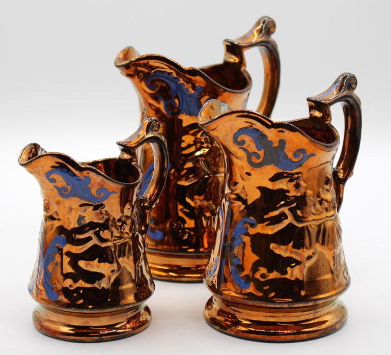 Circa 1860s Graduated Set of Copper Luster Pitchers For Sale at 1stDibs