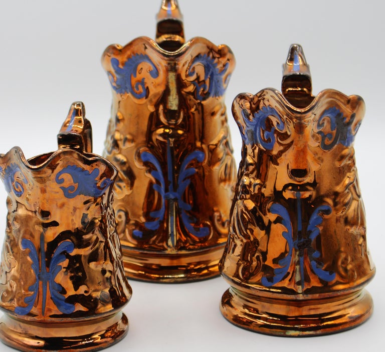 Circa 1860s Graduated Set of Copper Luster Pitchers For Sale at 1stDibs