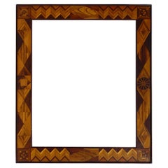 Large Carved Frame Decorated with a Nautical Theme and Holding a ...