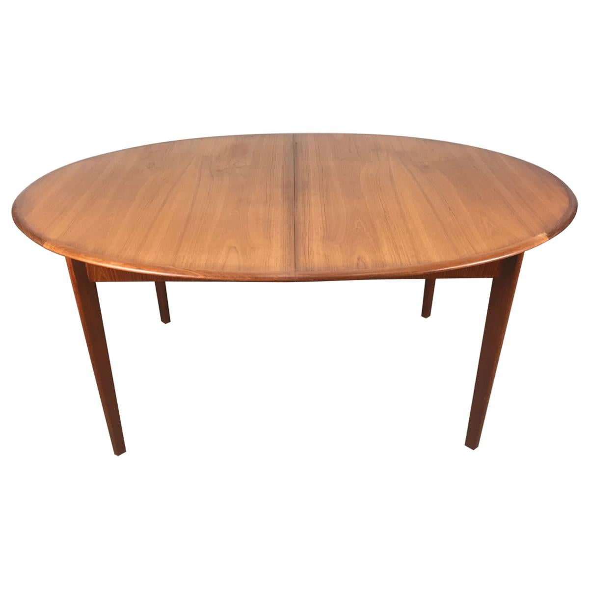 Classic Danish Modern Oval Extension Dining Table in Teak Wood at 1stDibs