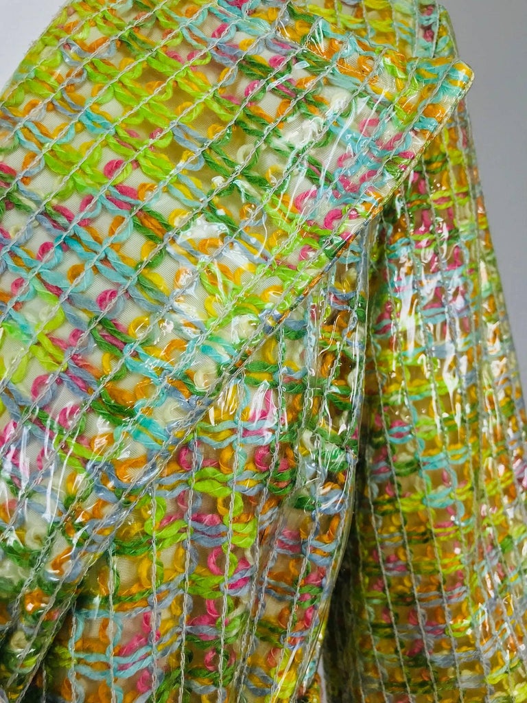 Clear vinyl covered tweed novelty rain coat with belt 1960s at 1stDibs