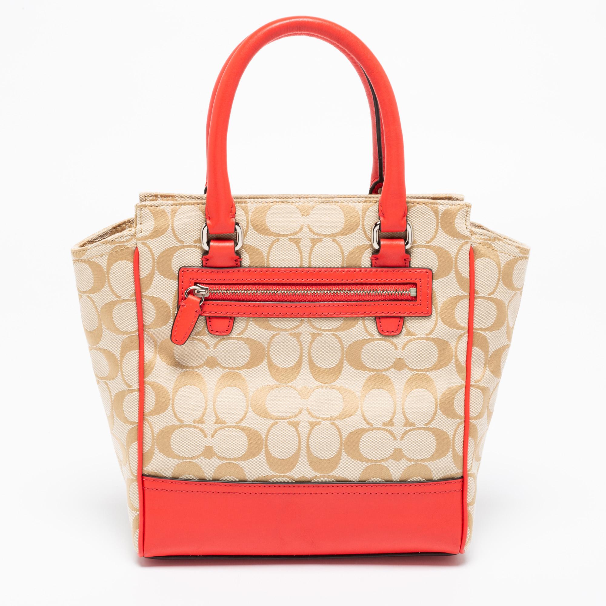 Coach Beige/Coral Pink Signature Canvas and Leather Tassel Tote at ...