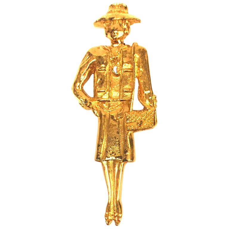 Coco Chanel Gold Plated Brooch at 1stDibs