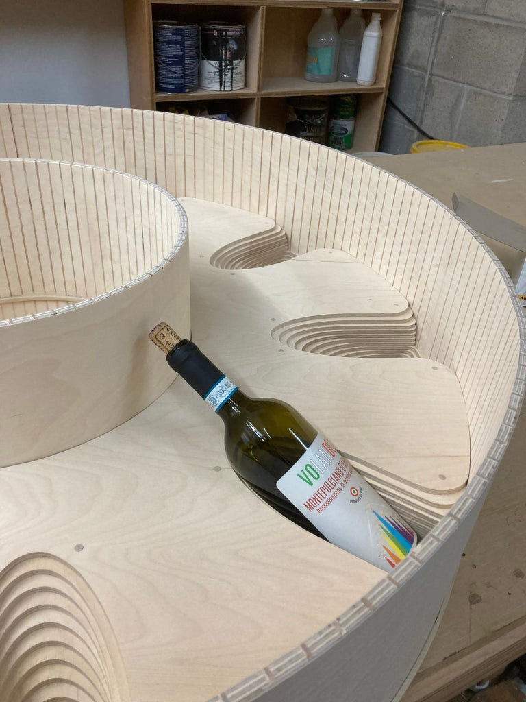 "Coco Drinks Wine", a Circular Table with Hidden Drawer Storage for ...