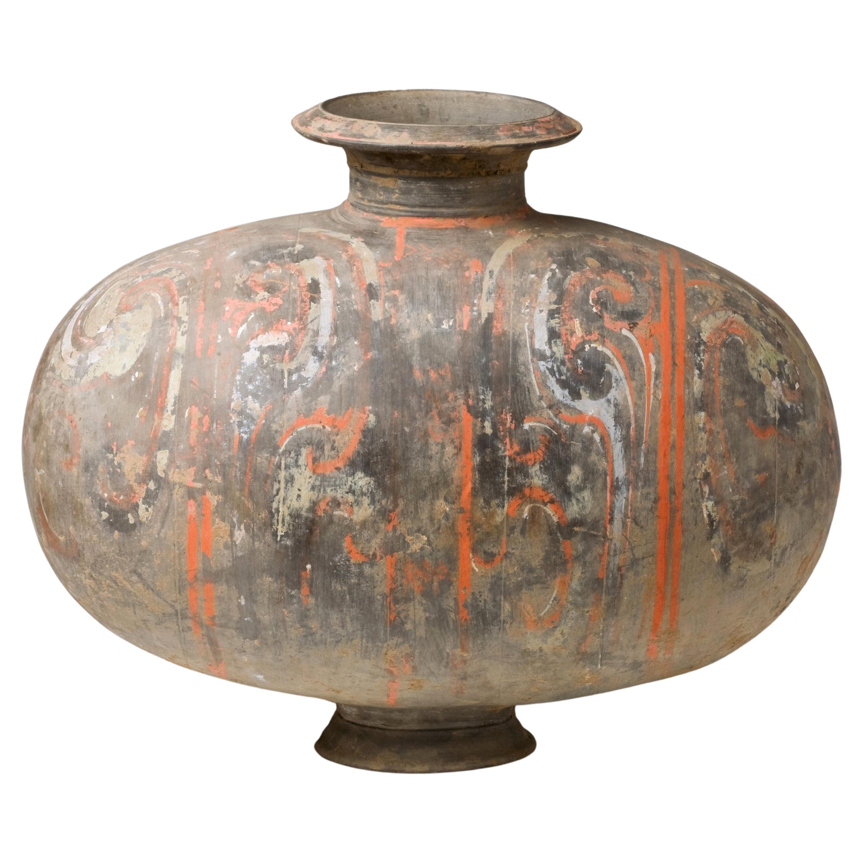 Cocoon-shaped jar with cloud-scroll design, Han Dynasty For Sale at 1stDibs