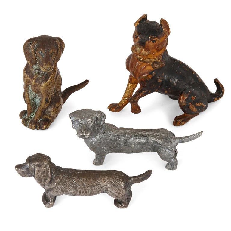 Collection of Twenty Metal Dogs of Various Types For Sale at 1stDibs
