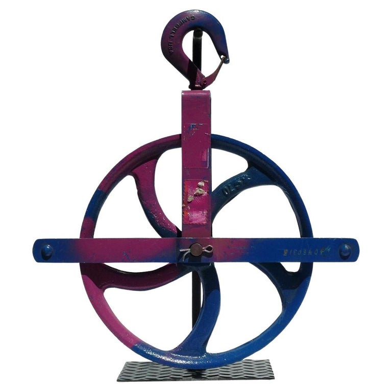 Colorful Painted Bright Blue Large Industrial Cast Iron Pulley on a ...
