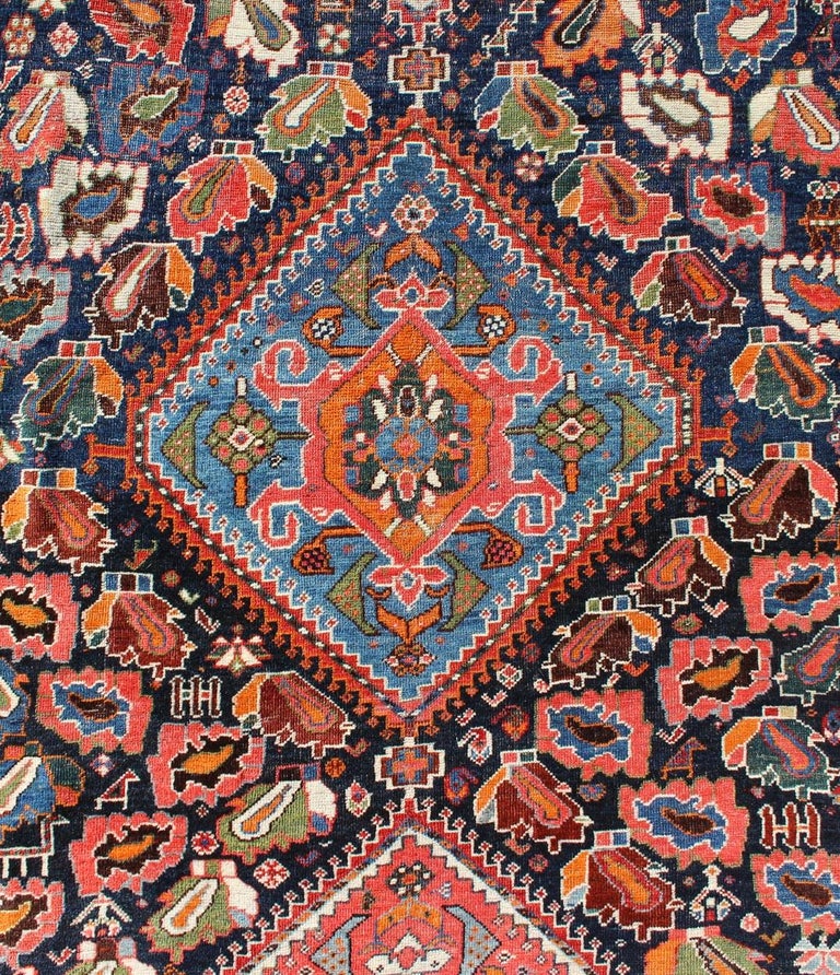 Colorful Tri-Medallion Antique Persian Qashqai Rug with Detailed Tribal ...