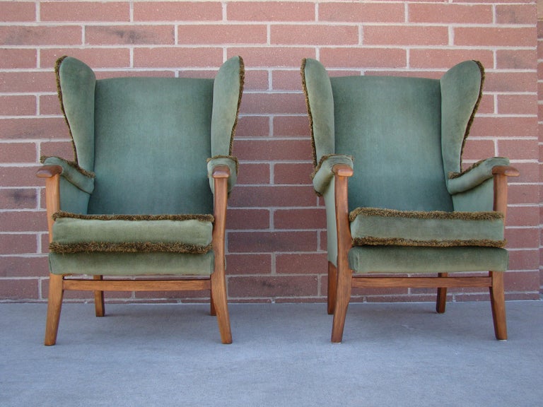 Compact Danish Wing-Backed Fireside Chairs with Wooden Paw Armrests at ...