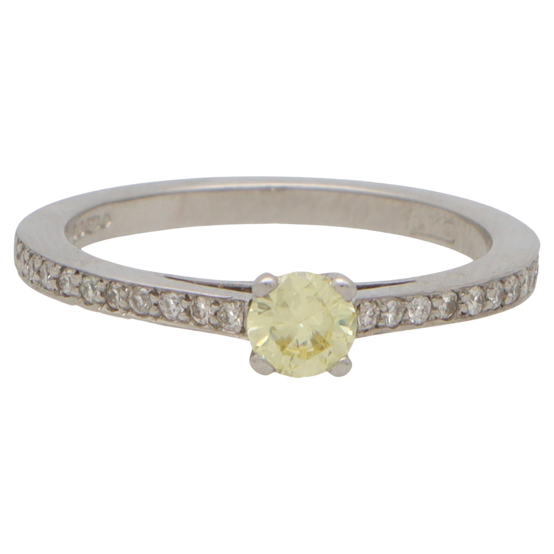 Contemporary 0.23ct Round Cut Yellow Diamond Ring in Platinum For Sale ...