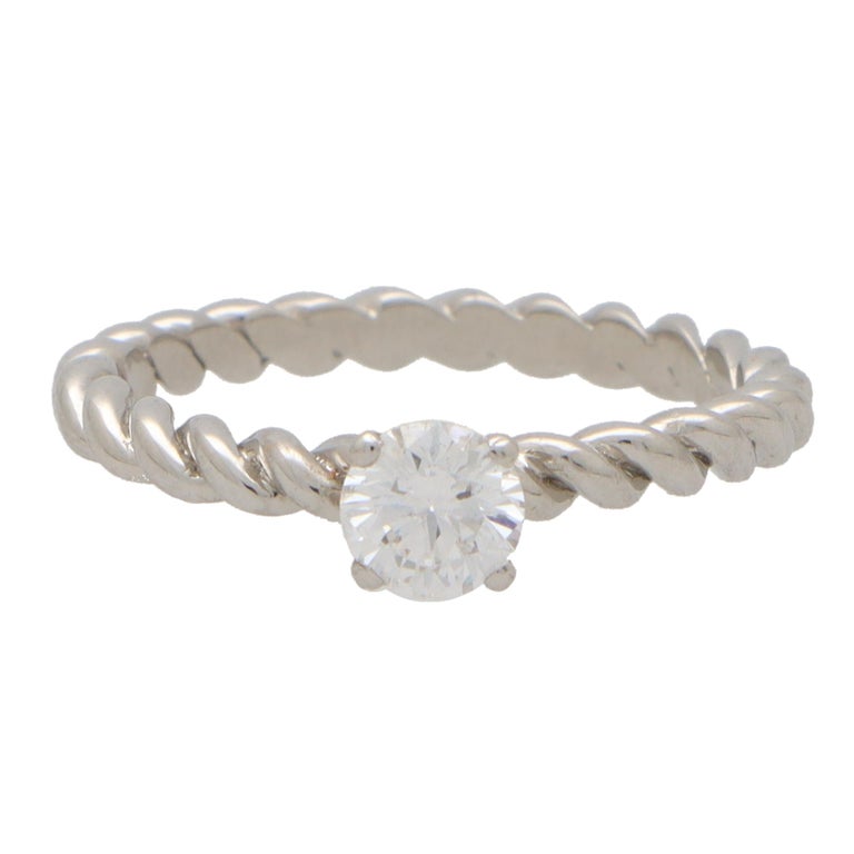 Contemporary 0.50ct Round Cut Diamond Solitaire With Twisted Band in ...