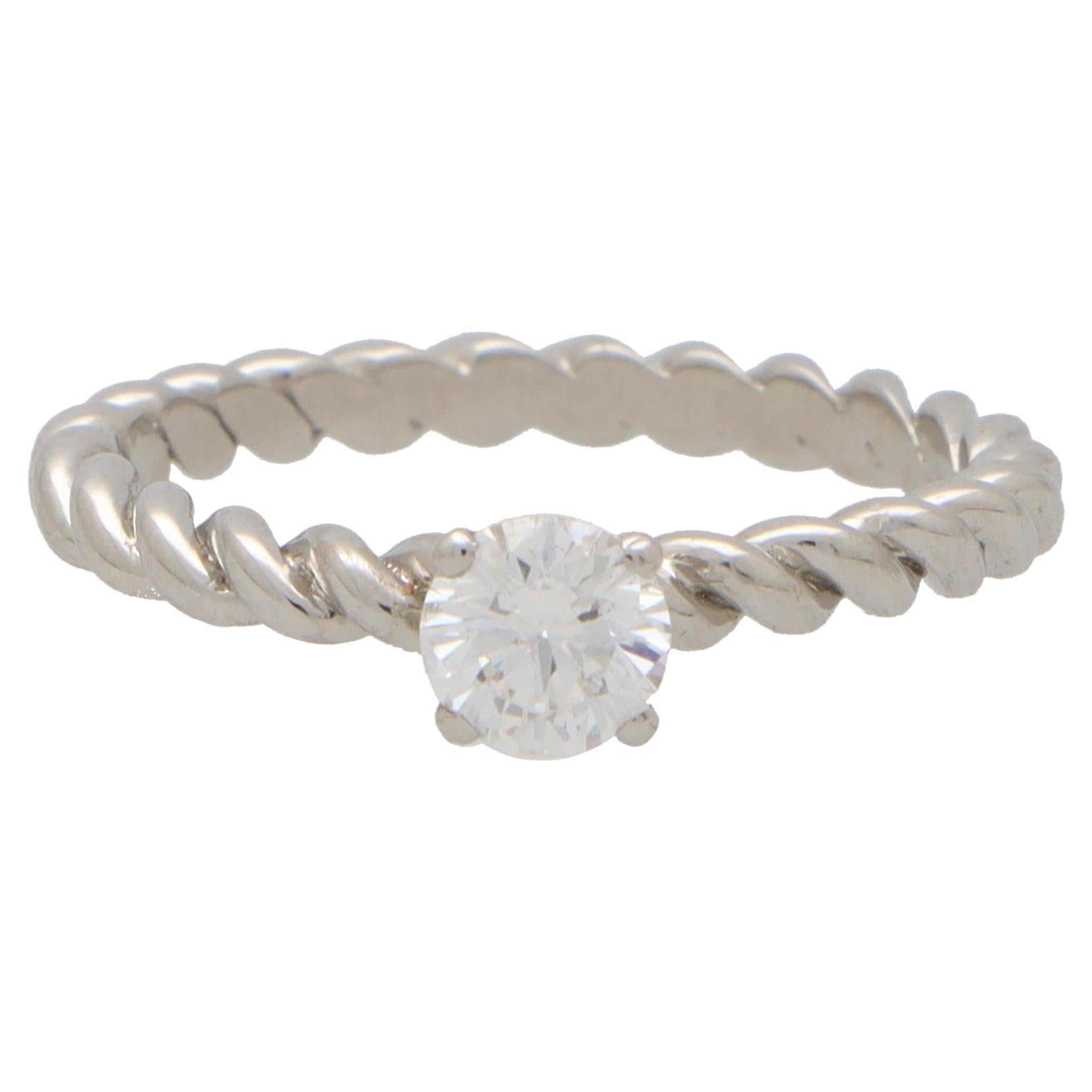 Contemporary Round Cut Diamond Solitaire Ring with Twisted Band in ...