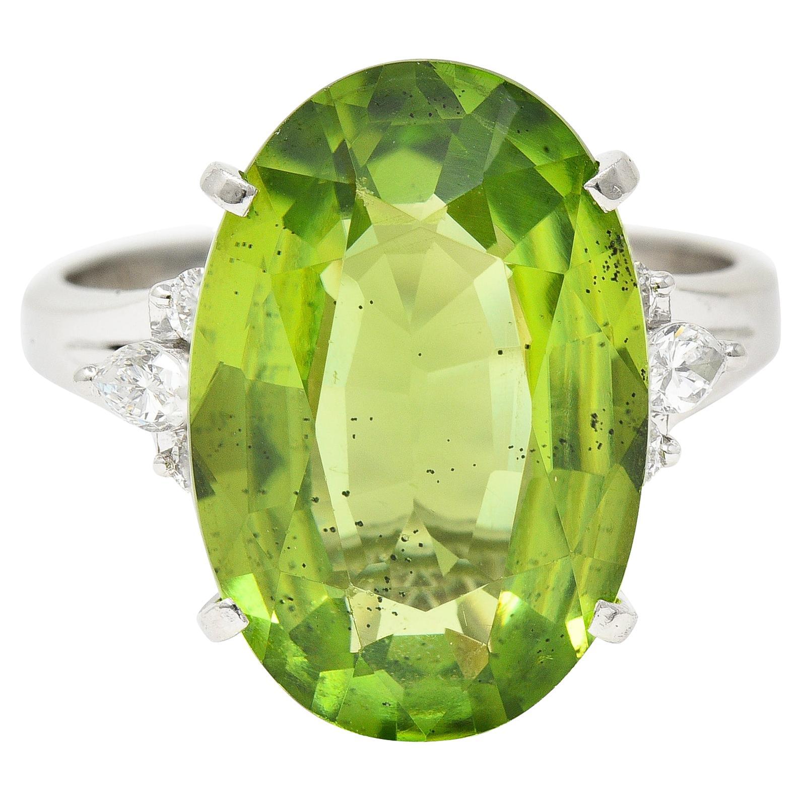 Contemporary 9.42 Carats Oval Cut Peridot Diamond Platinum Cluster Ring ...
