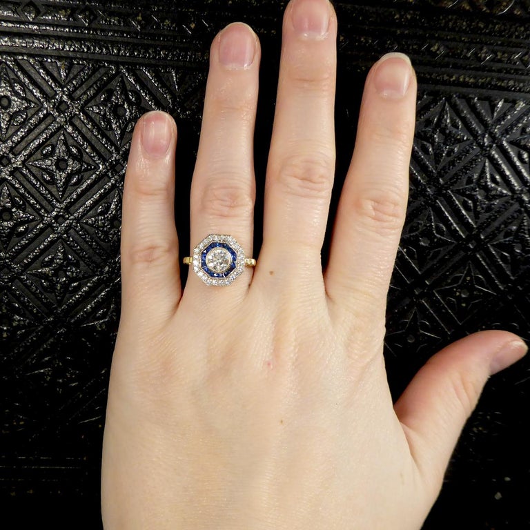 Contemporary Diamond and Sapphire Target Ring Modelled in 18 Carat Gold ...
