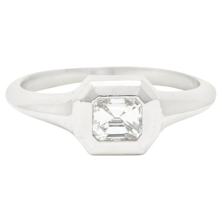 Contemporary Emerald Cut Diamond Platinum Flush Set Solitaire ...