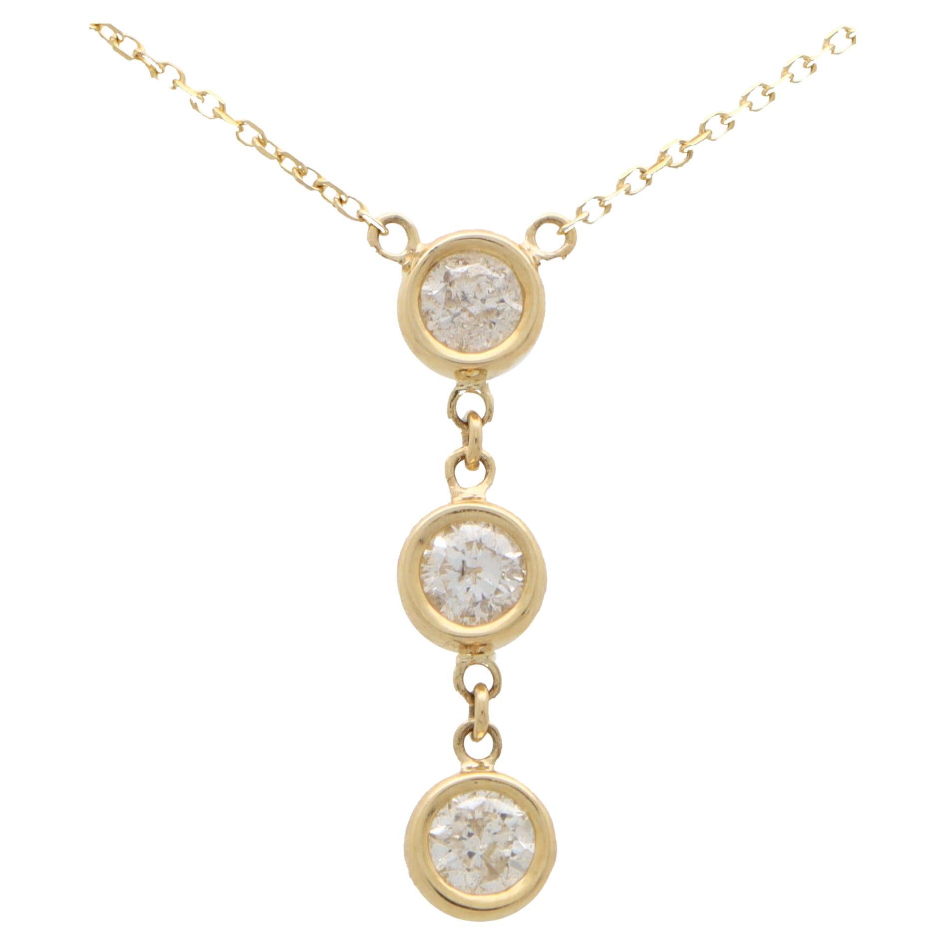Contemporary Graduating Diamond Pendant Set in 14k Yellow Gold For Sale ...