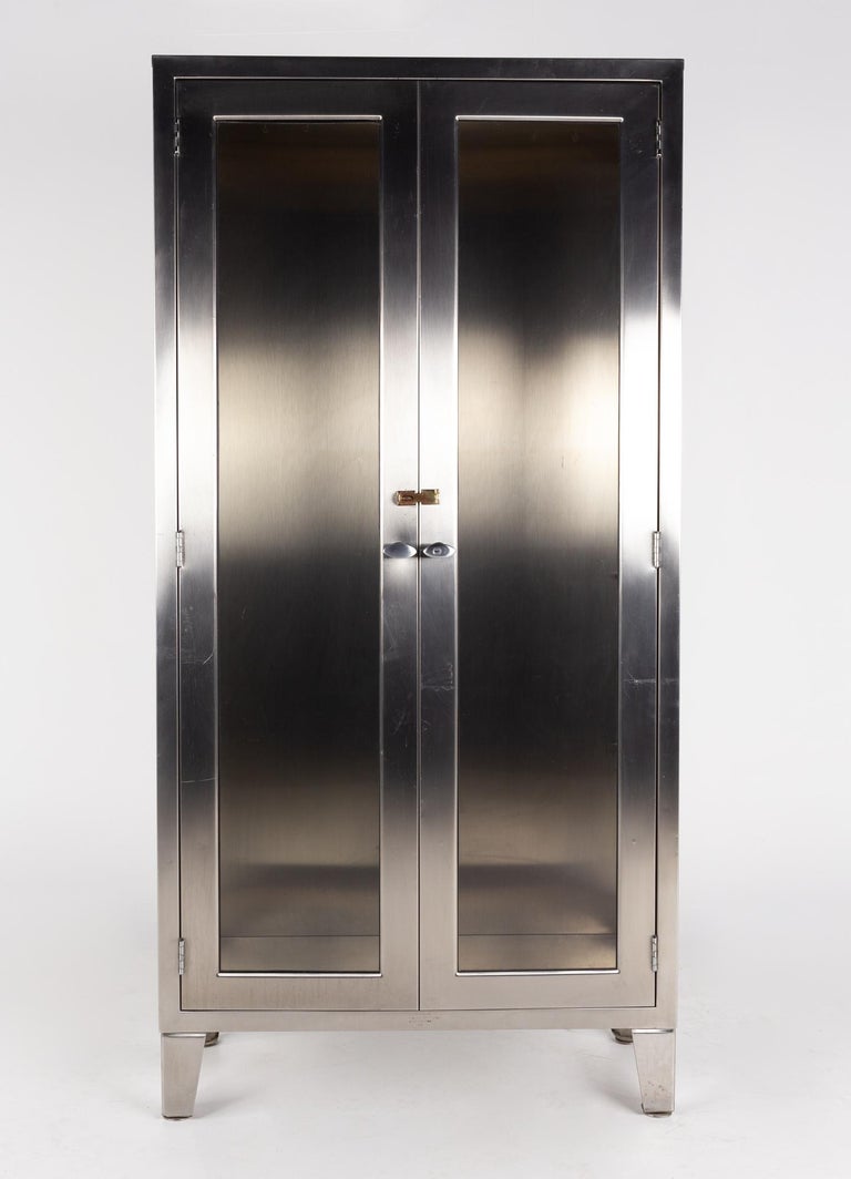 Contemporary Stainless Steel Display Cabinet with Glass Shelves at 1stDibs