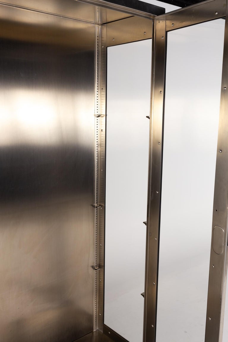 Contemporary Stainless Steel Display Cabinet with Glass Shelves at 1stDibs