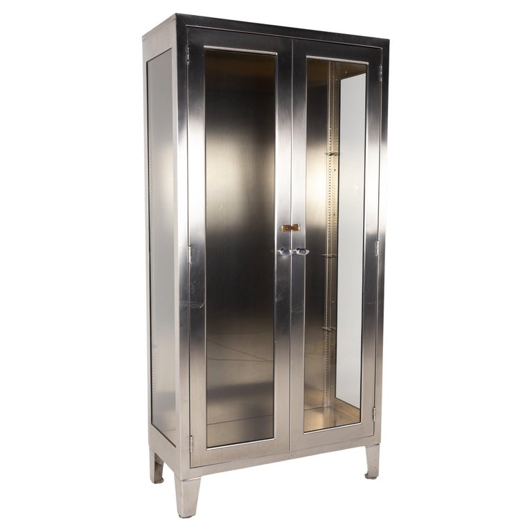 Contemporary Stainless Steel Display Cabinet with Glass Shelves at 1stDibs