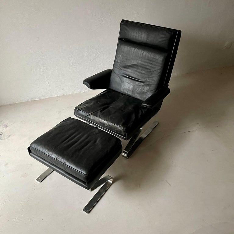 COR Swing Designer Armchair in Leather with Ottoman For Sale at 1stDibs