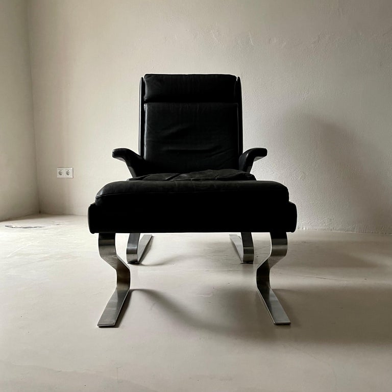 COR Swing Designer Armchair in Leather with Ottoman For Sale at 1stDibs