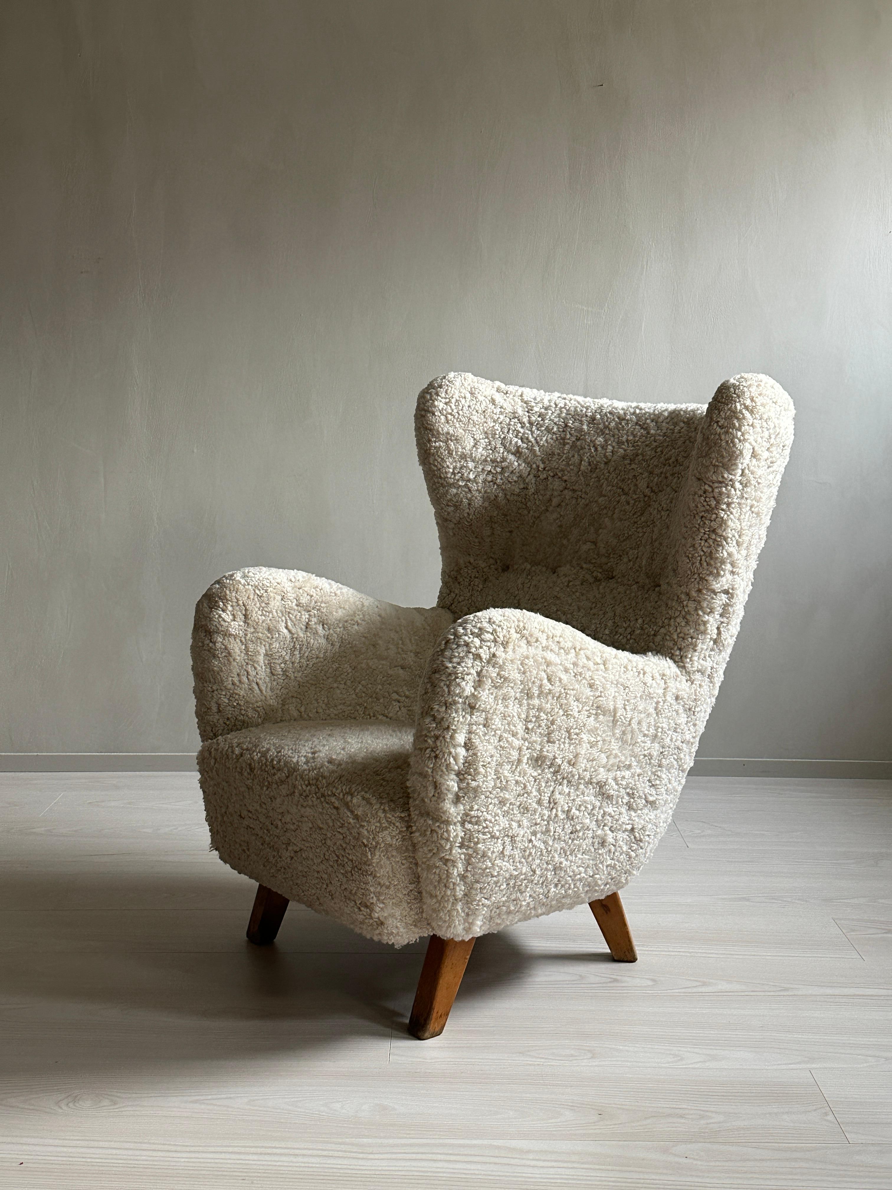 Danish Cabinetmaker Lounge Chair in Sheepskin, Denmark, 1940s at 1stDibs