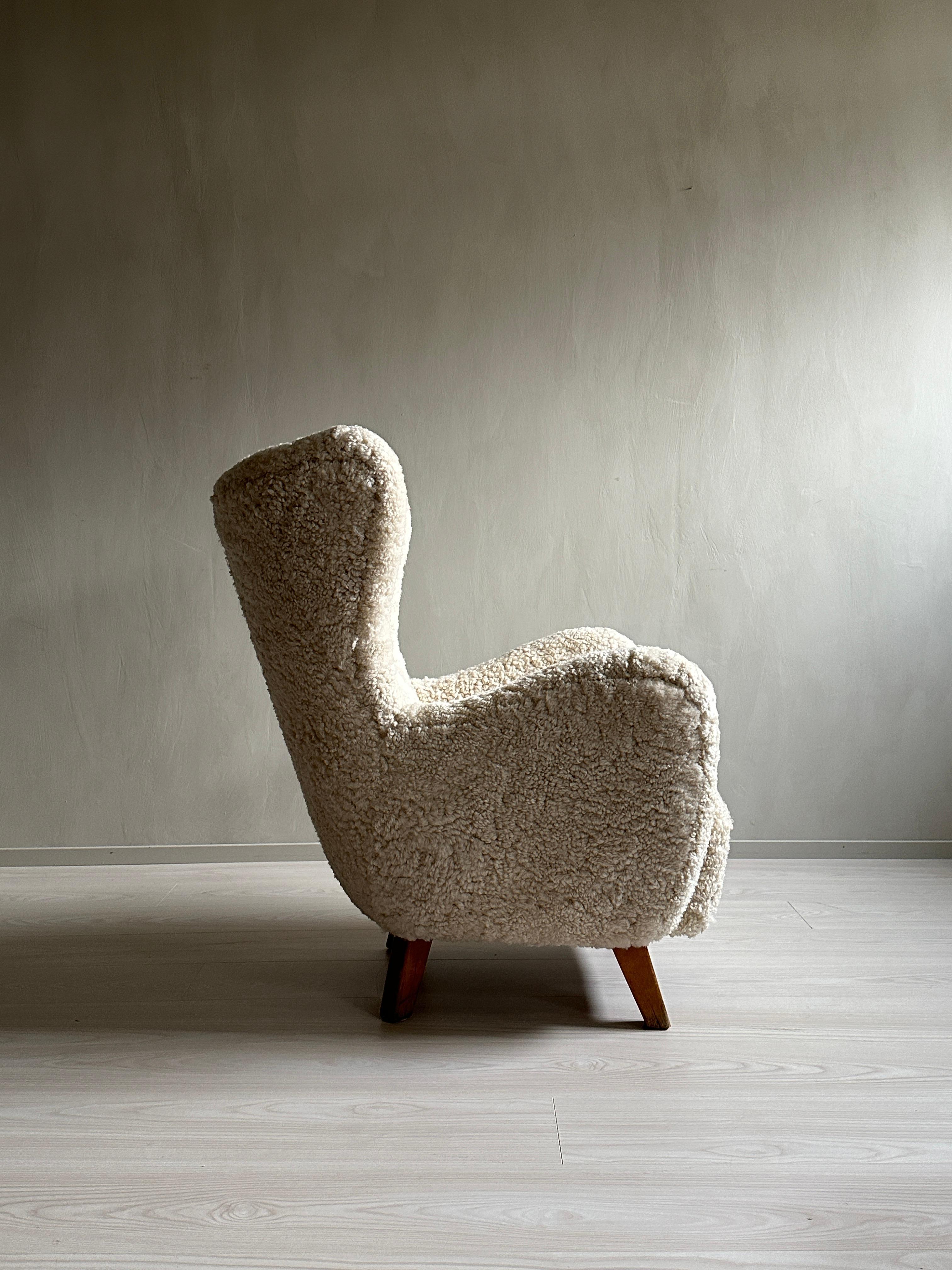 Danish Cabinetmaker Lounge Chair in Sheepskin, Denmark, 1940s at 1stDibs