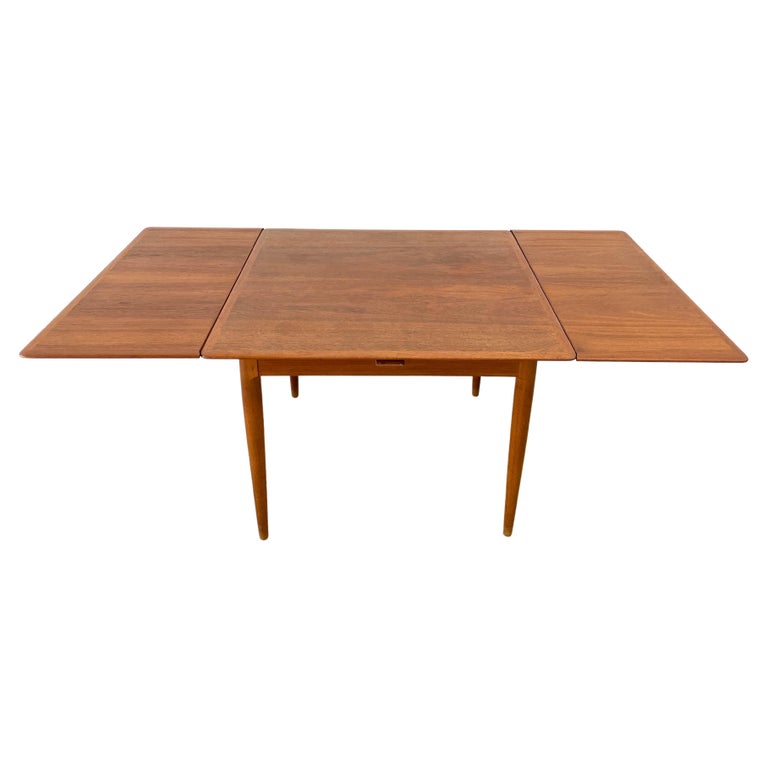 Danish Expanding Teak Dining Table For Sale at 1stDibs